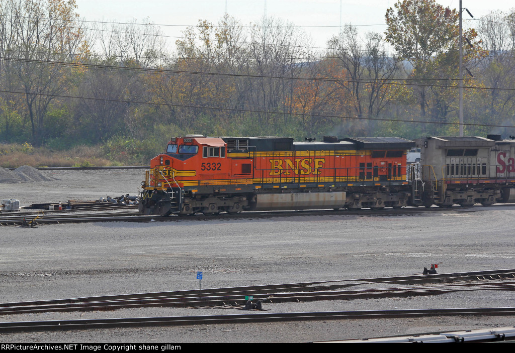 BNSF 5332 shoves back into the yard.